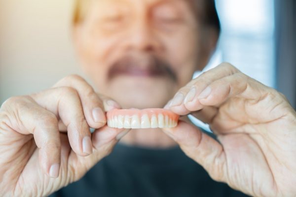 Restore Full Smiles with Seamless Denture Services at Carmichael DDS